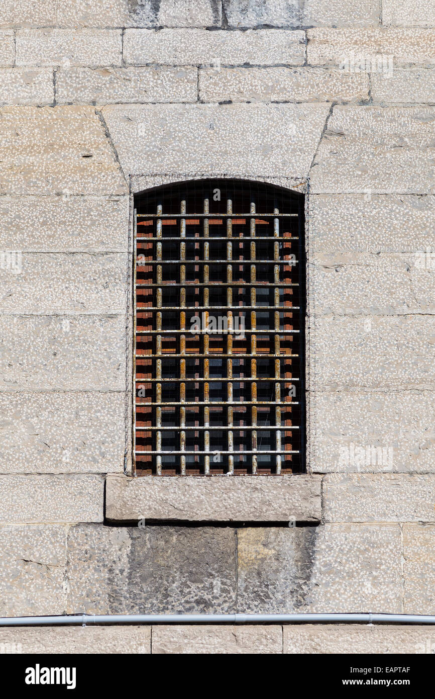 Closeup to a window with bars Stock Photo - Alamy