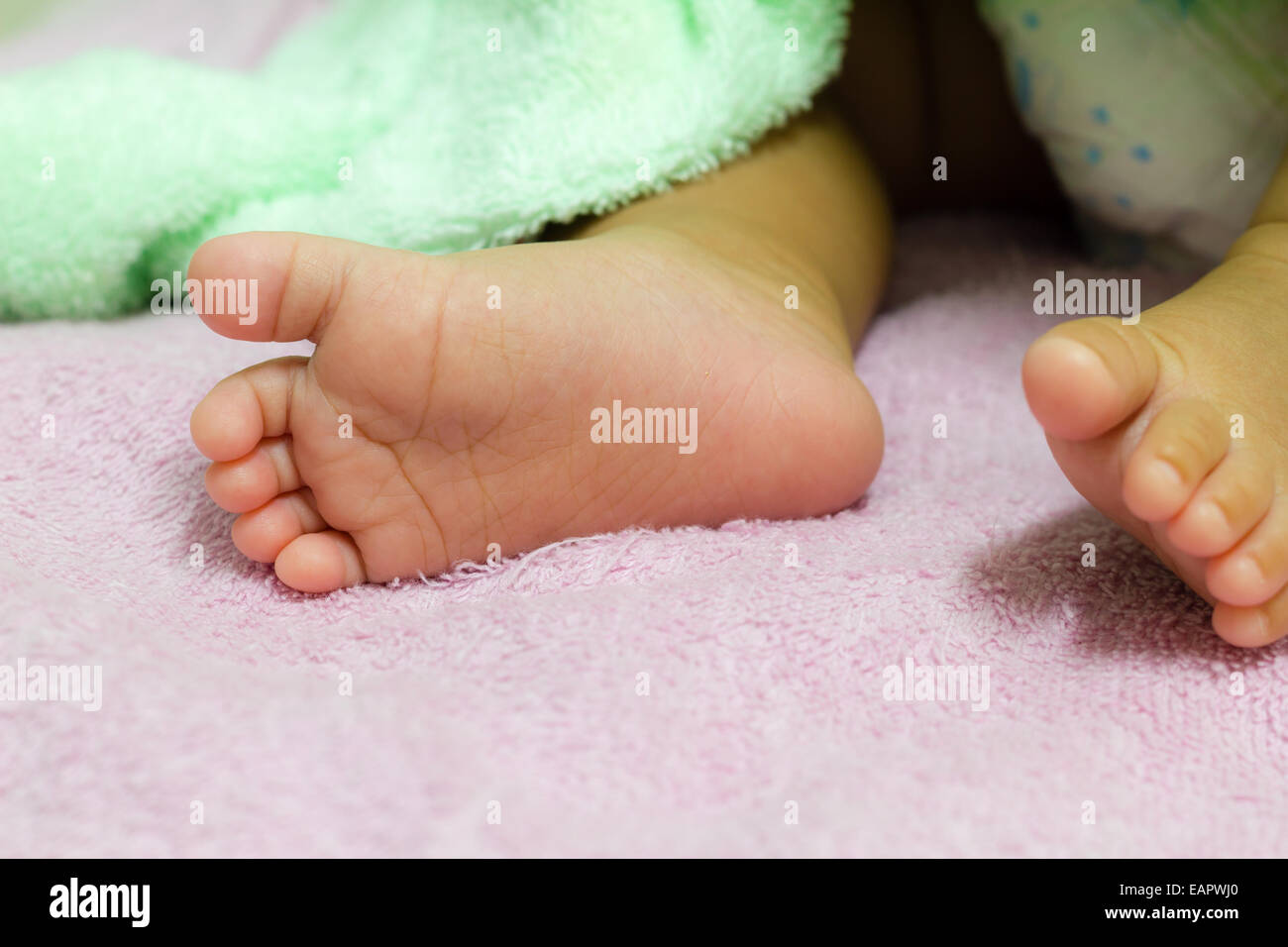 A close-up of baby feet. focused on foot Stock Photo - Alamy