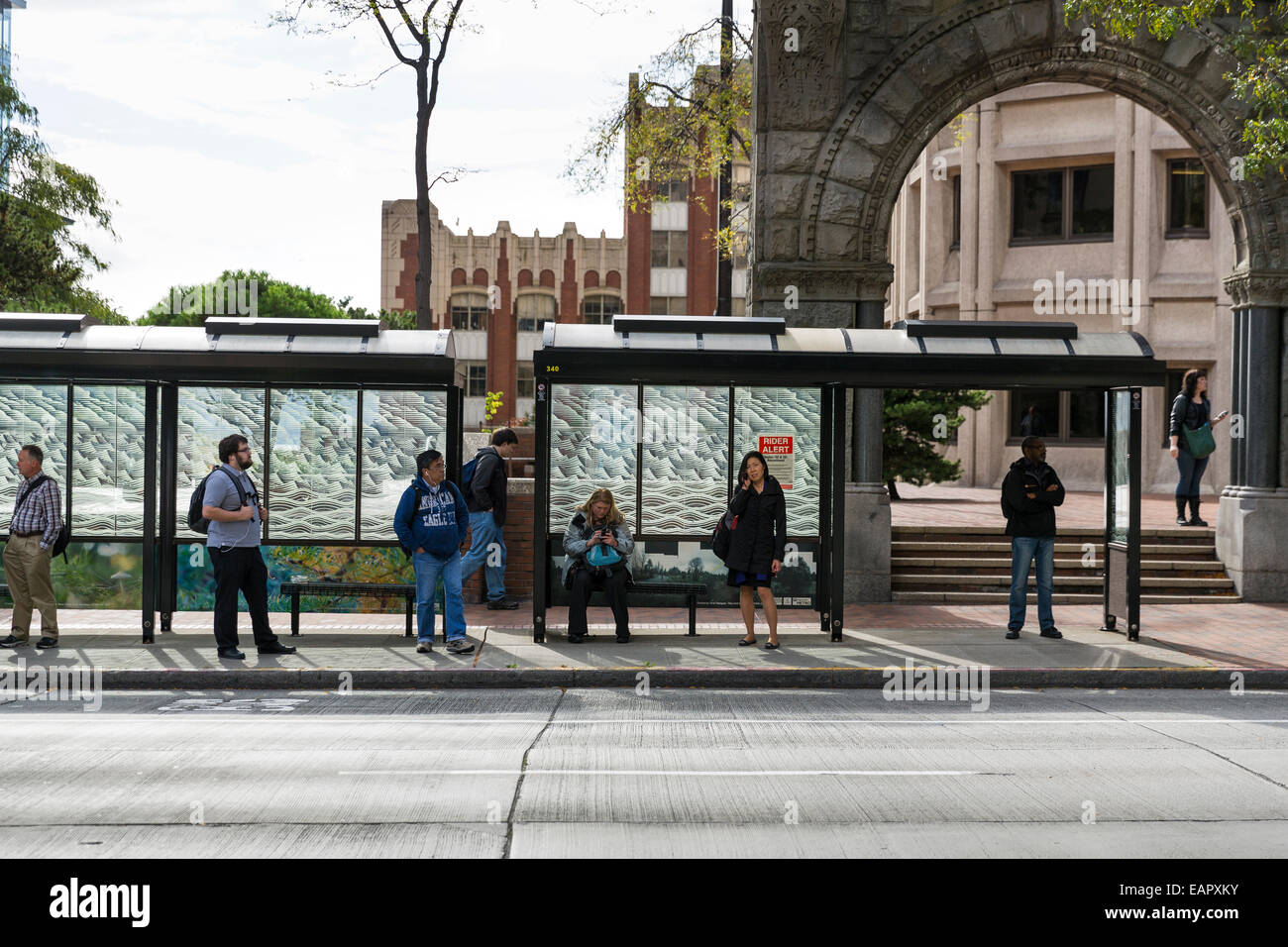People waiting at the bus stop in Seattle, Washington Stock Photo - Alamy