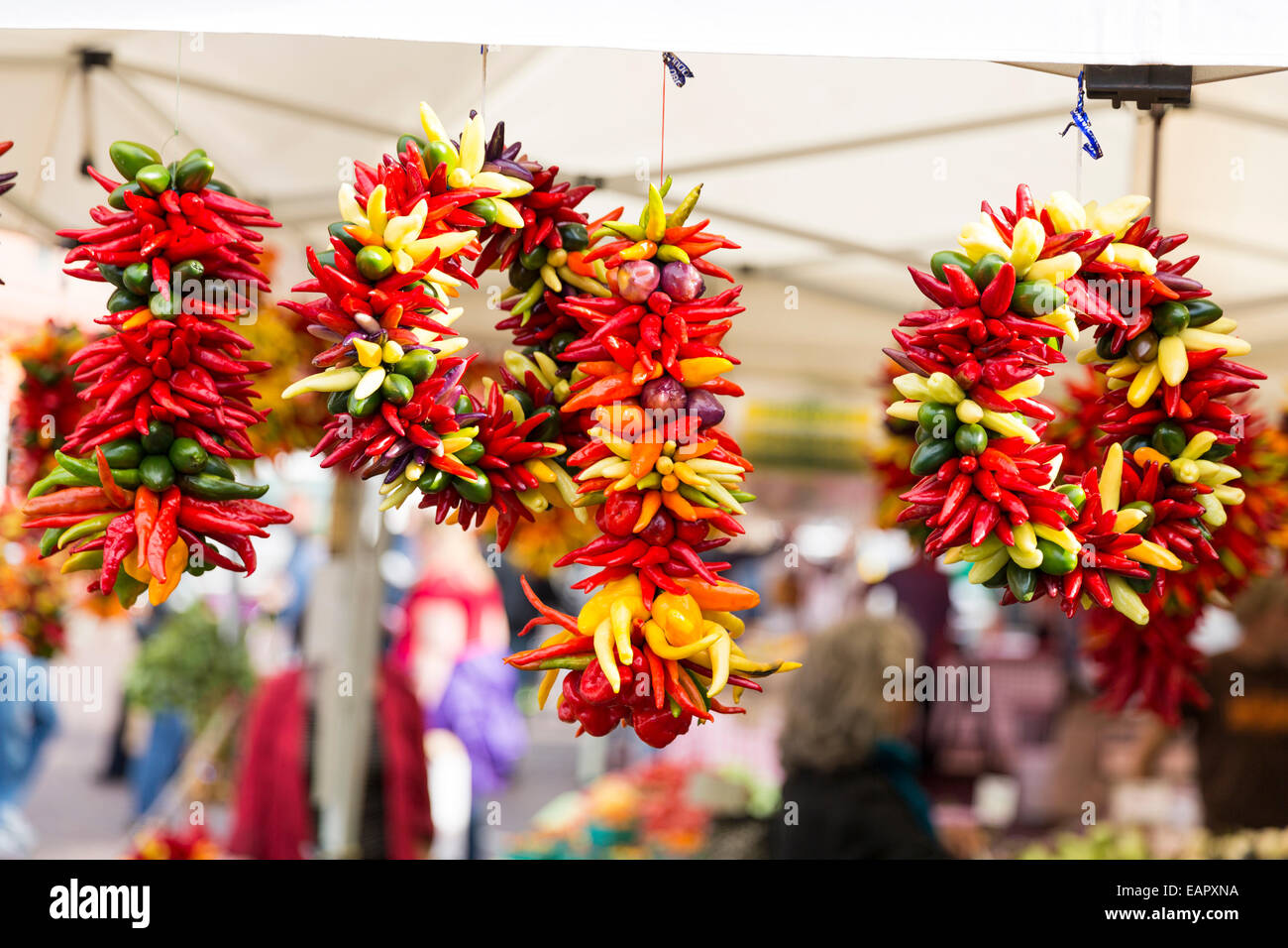 Decorative colorful pepper strings at the Pike Place Market open air ...