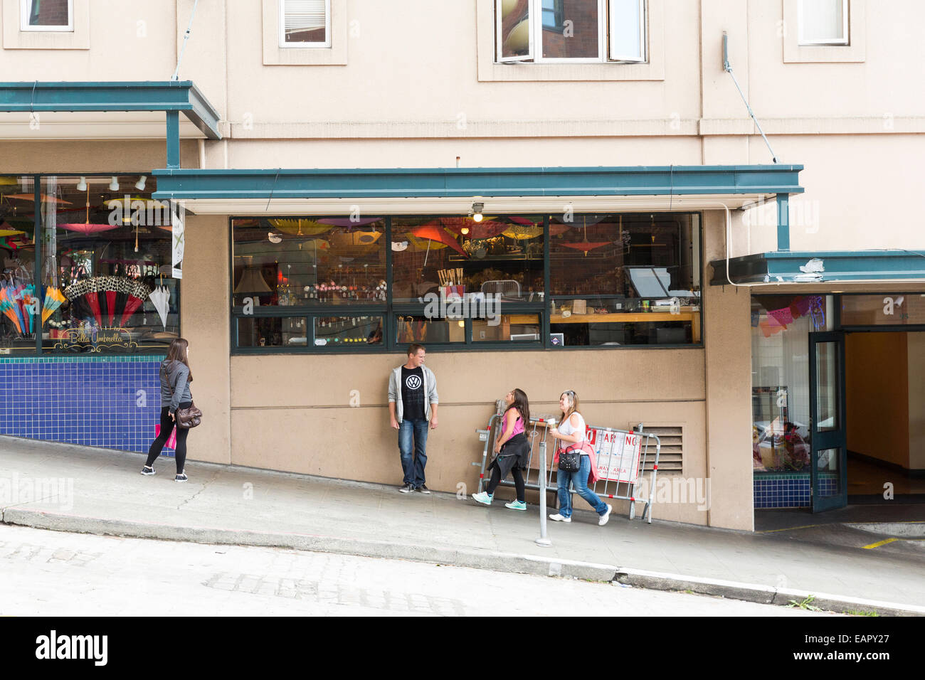 People walking up the steep street in Seattle Stock Photo - Alamy