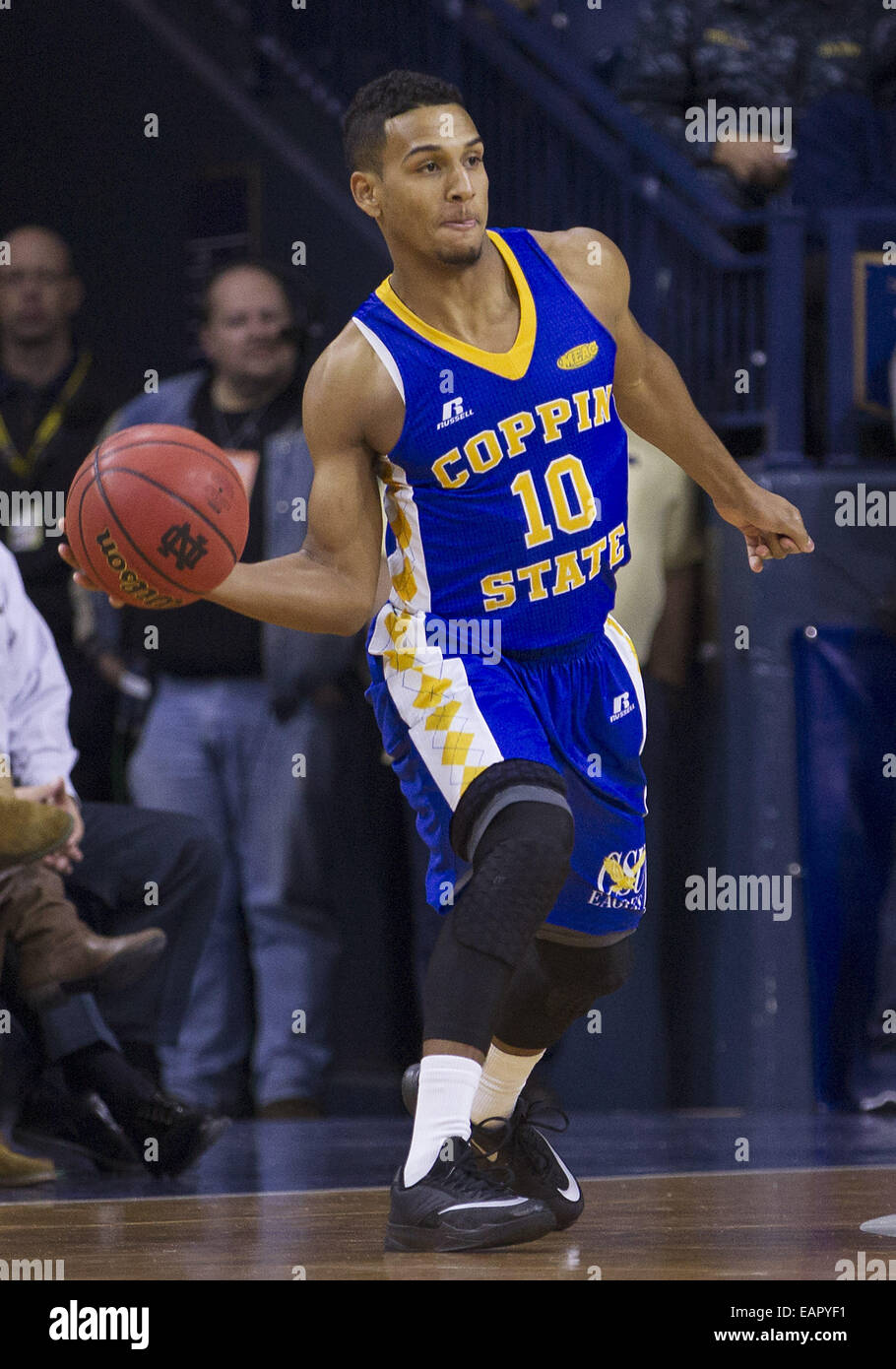 November 19, 2014: Coppin Stats guard Christian Kessee (10) passes the ...
