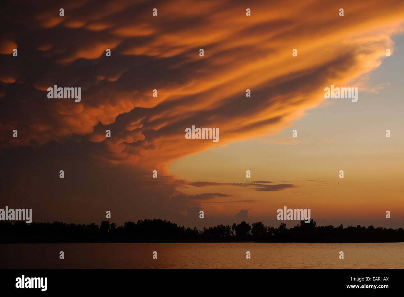 Storm clouds at sunset Stock Photo - Alamy