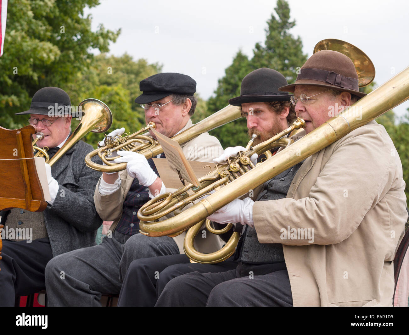 Brass Band at the Village Fair. A brass band plays vintage instruments ...