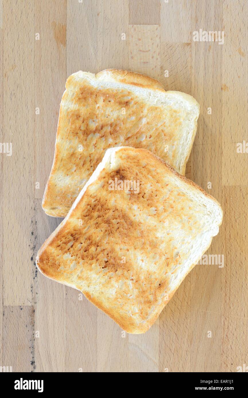 A close up shot of pieces of toast Stock Photo - Alamy