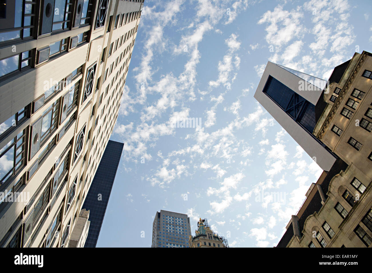 A view of the sky in downtown New York City, NY surrounded by buildings ...