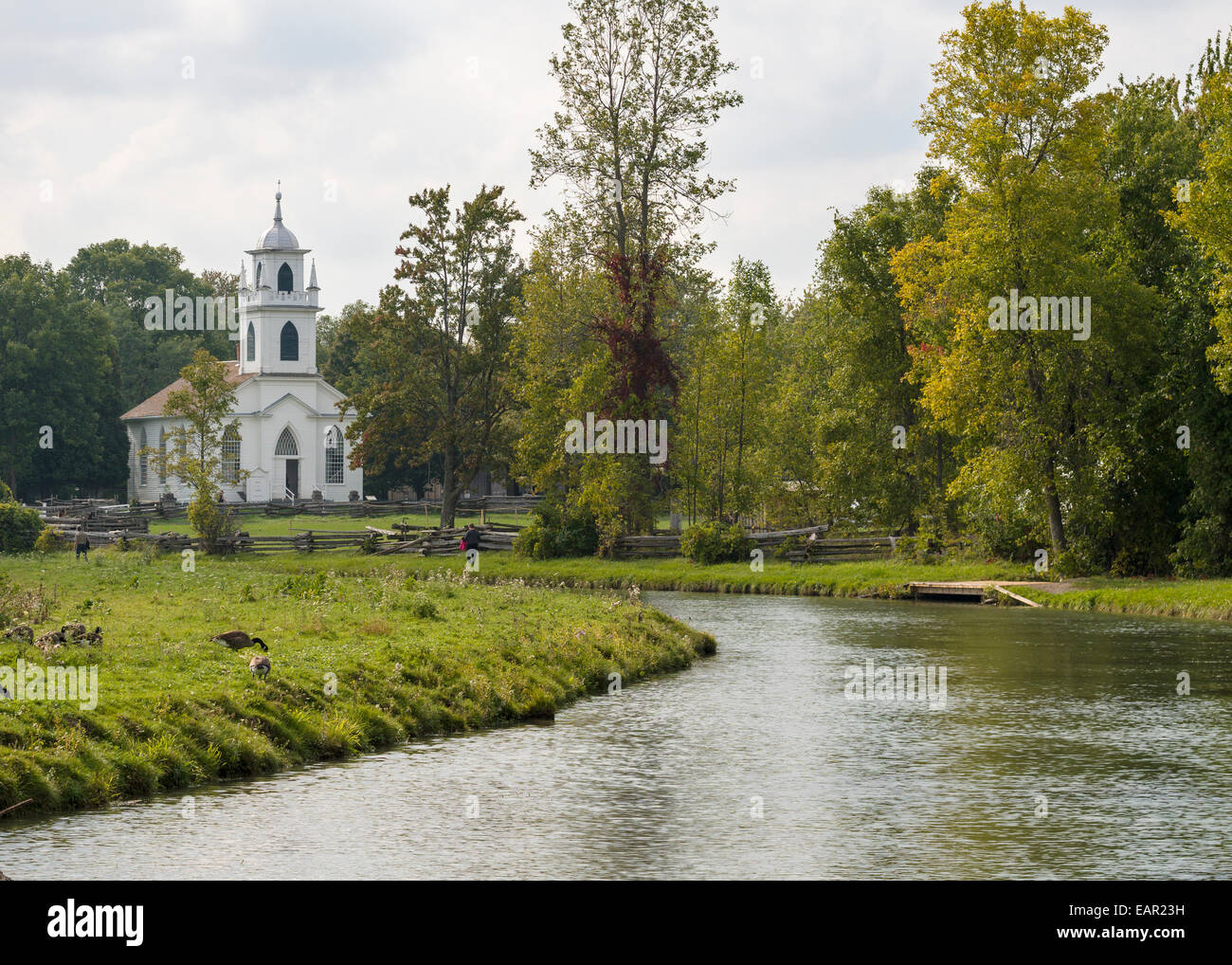The Village Church with stream. The white clapboard village church with ...
