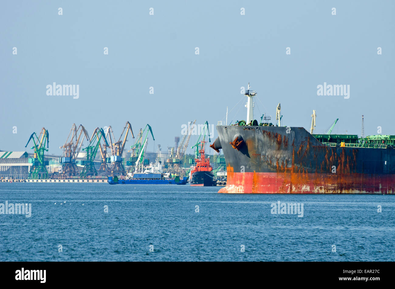 old industrial cargo ship in Europe port Stock Photo - Alamy