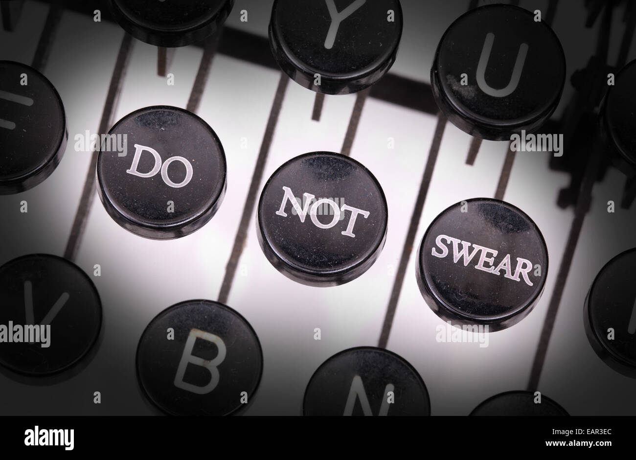 Typewriter with special buttons, do not swear Stock Photo - Alamy