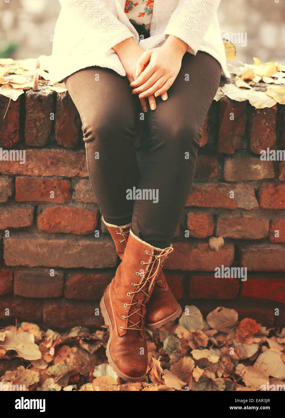 Woman legs kicking autumn fall hi-res stock photography and images - Alamy