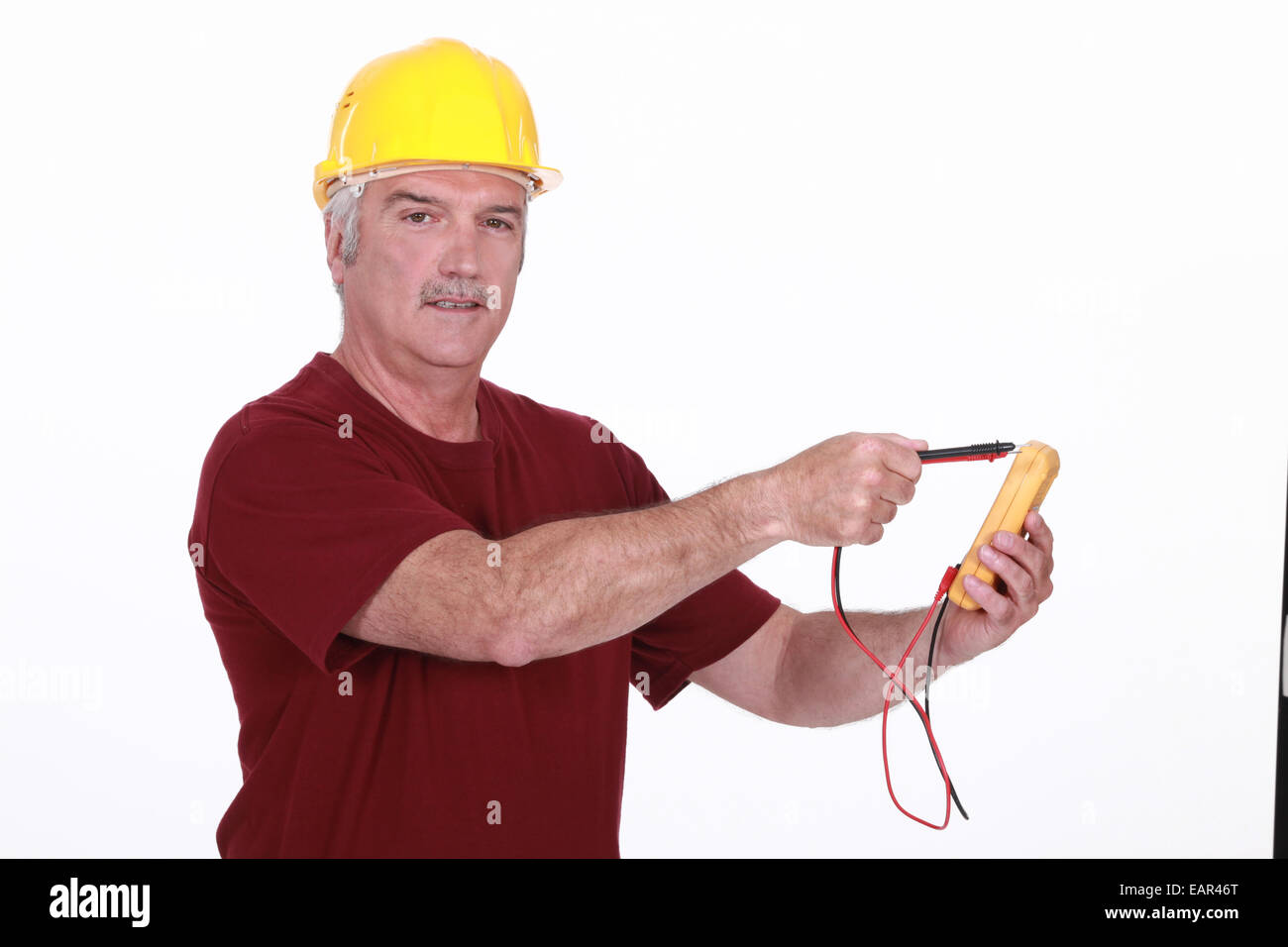 Man with a multimeter Stock Photo - Alamy