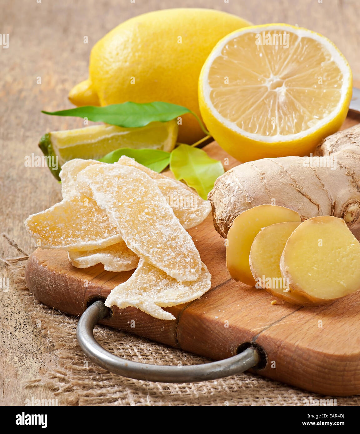 Fresh ginger root, candied ginger and lemon Stock Photo - Alamy