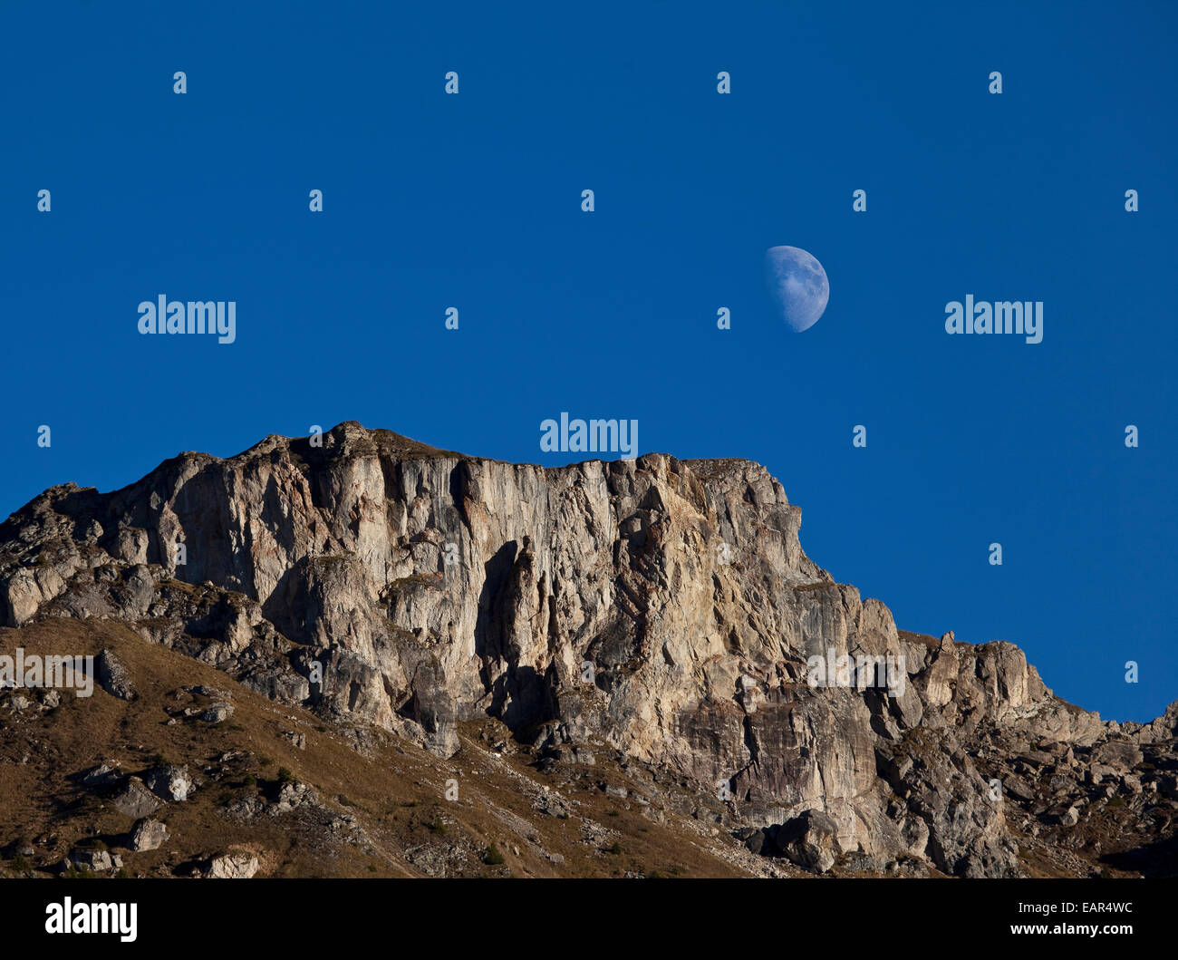 Half moon over the cliff Stock Photo - Alamy