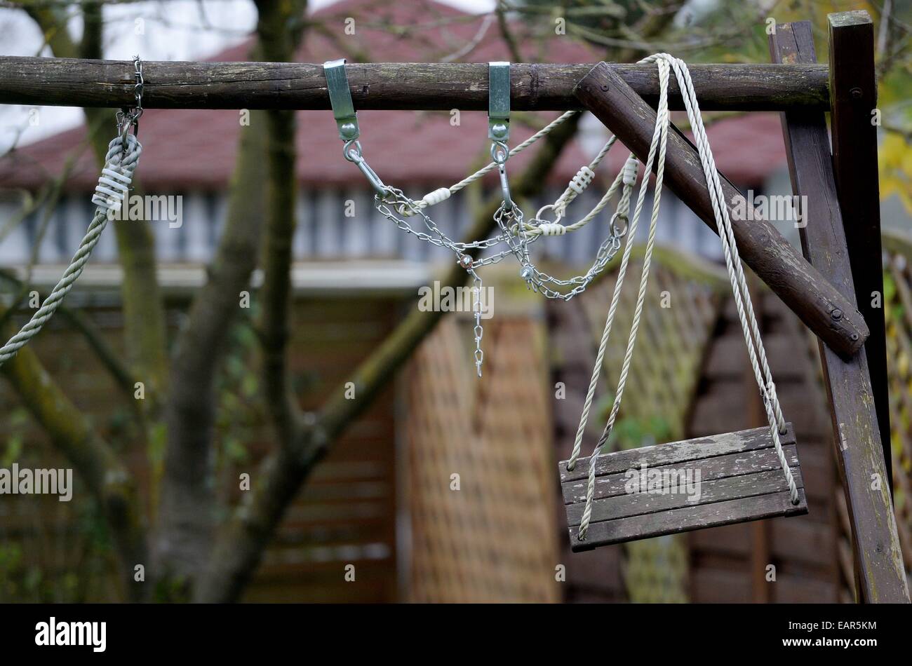 A swing for kids in a garden in germany, 19. November 2014. Photo ...