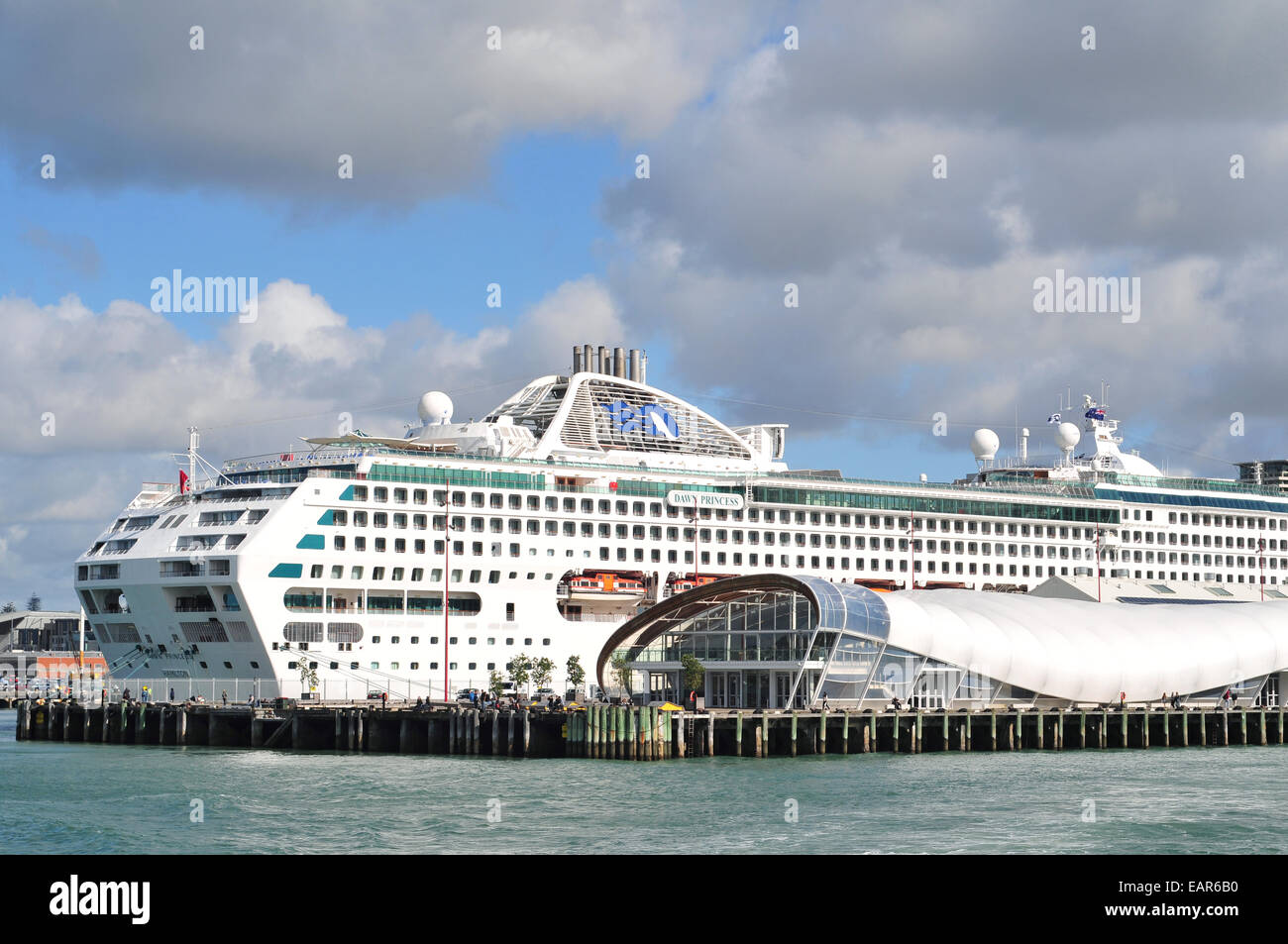 Large cruise ship docked next to The Cloud venue built on jetty in ...