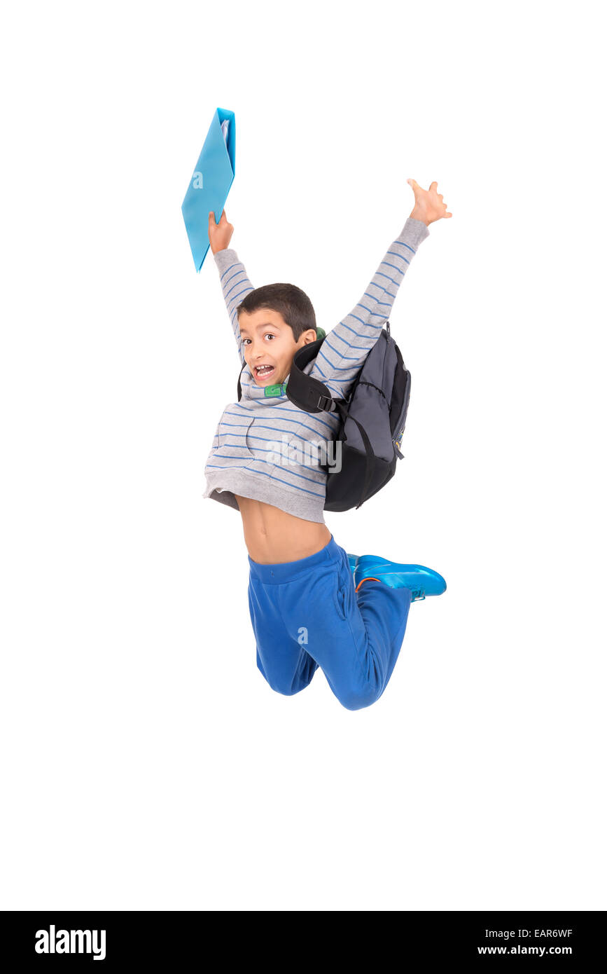 Young boy student jumping isolated in white Stock Photo - Alamy