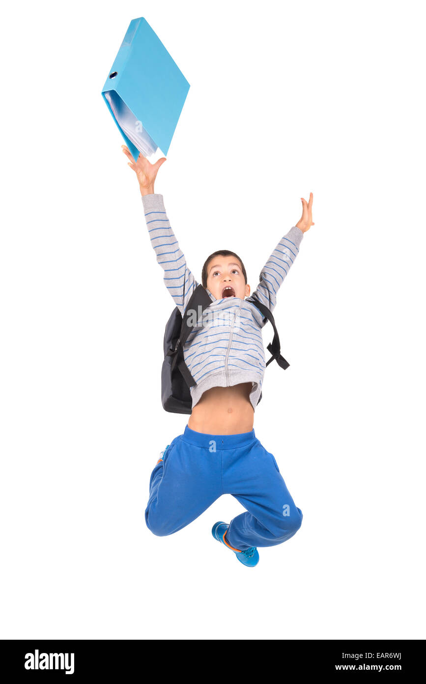 Young boy student jumping isolated in white Stock Photo - Alamy