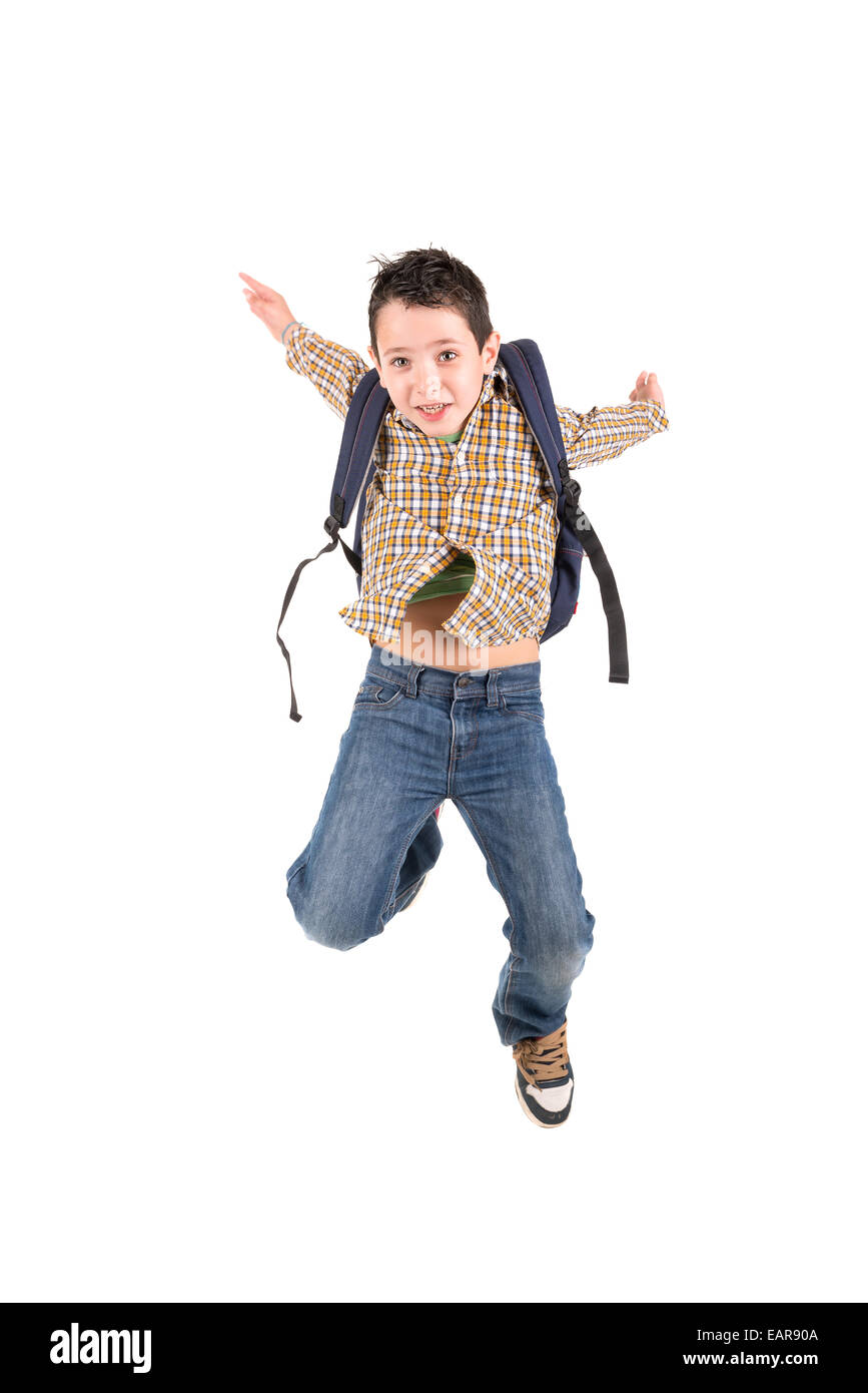 Young boy student jumping isolated in white Stock Photo - Alamy