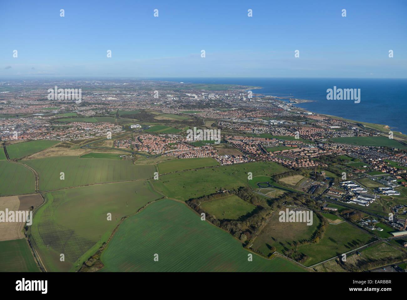 An aerial view of the countryside and coastline of County Durham with ...
