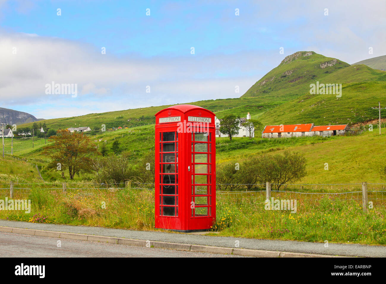 Traditional British phone-box in the countryside Stock Photo - Alamy