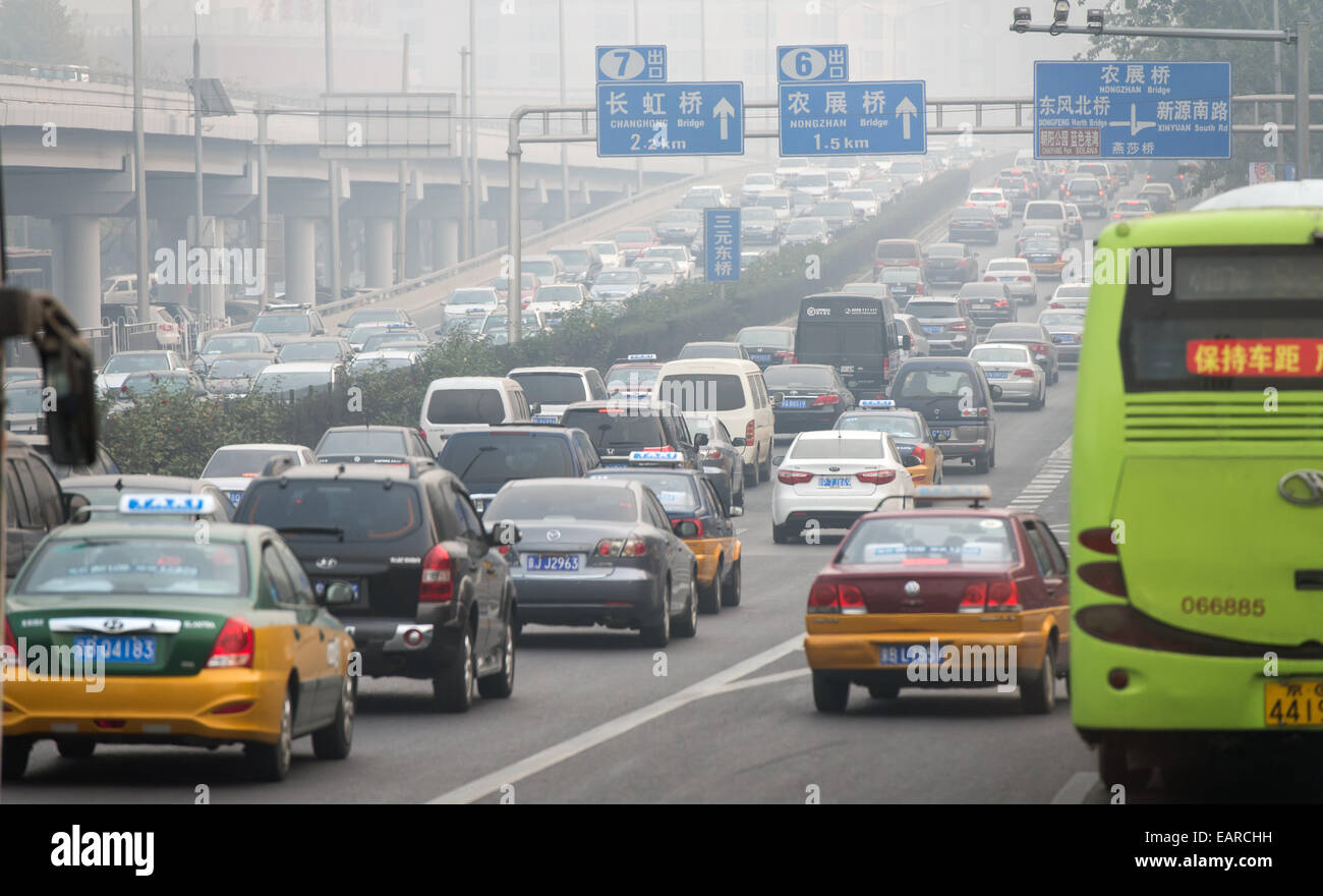 Beijing, China. 20th Nov, 2014. Cars drive on highly busy streets in ...
