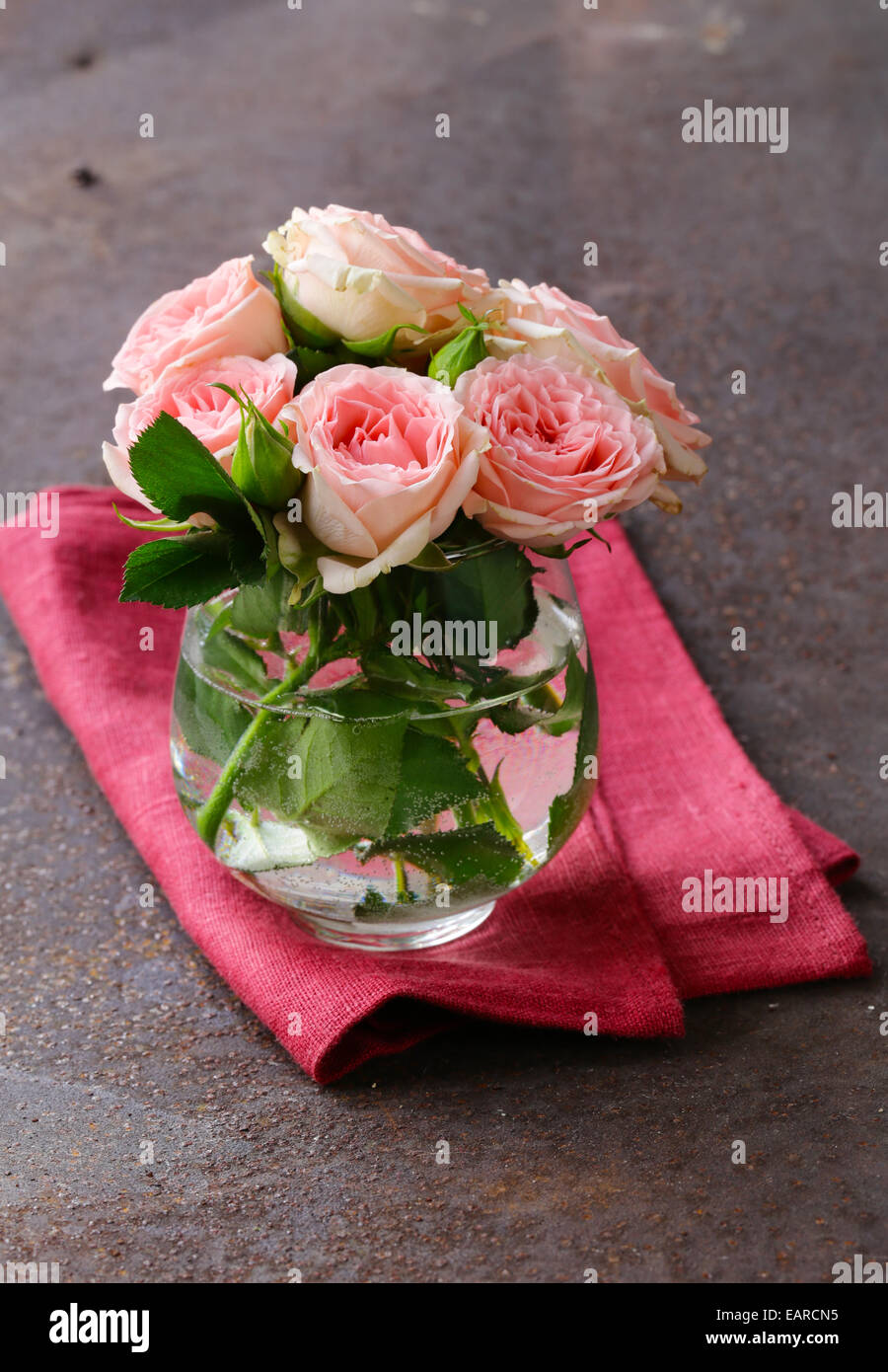 bouquet of pink roses on a table Stock Photo - Alamy