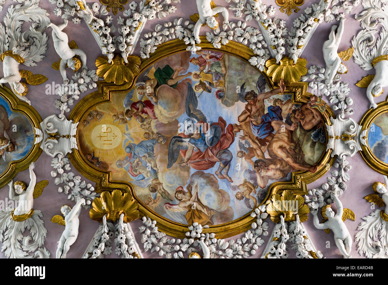 Baroque stucco ceiling with cherubs, angels and frescoes in the ...