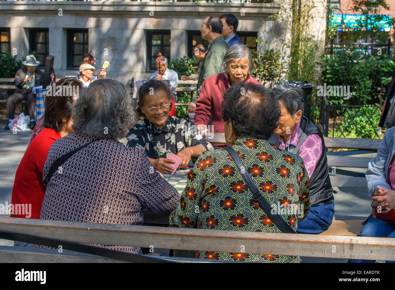 Asian women playing cards hi-res stock photography and images - Alamy