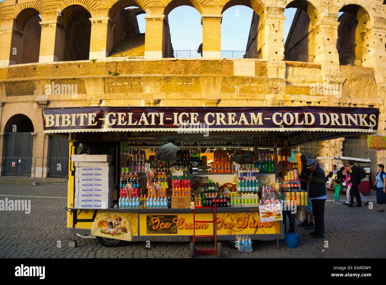 Drinks stall in front of colosseum, ancient Rome, Italy Stock Photo - Alamy