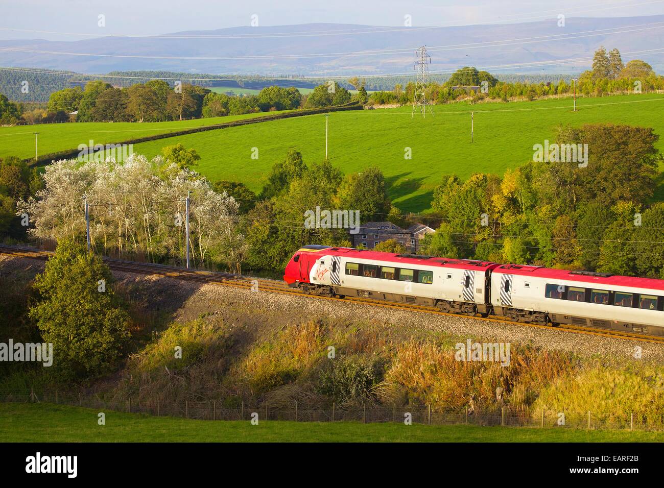 Class 390 Pendolino Virgin train passing Strickland Mill, Great ...