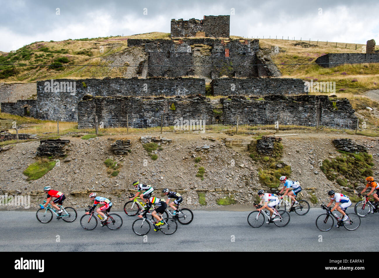 Professional cyclists passing the ruined lead mines in the 'Tour of the ...