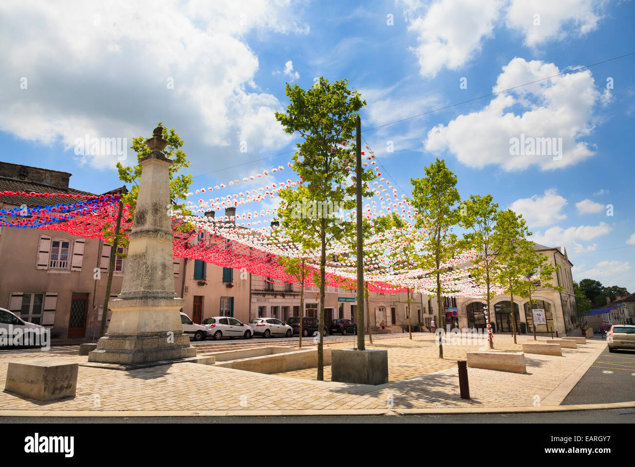 Verteillac town centre decorated for the June carnival Stock Photo - Alamy