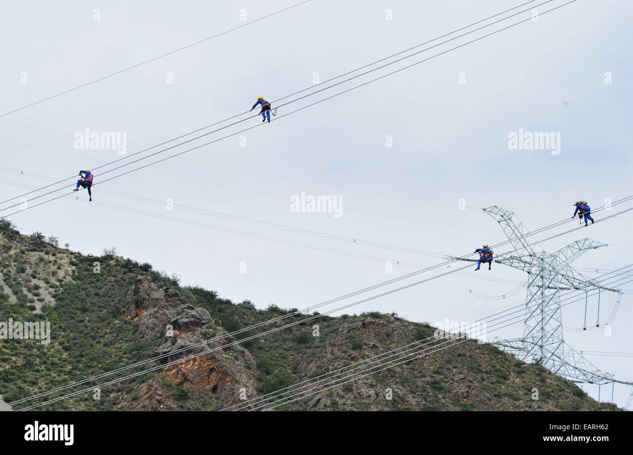 Electrical wires workers in china hi-res stock photography and images ...