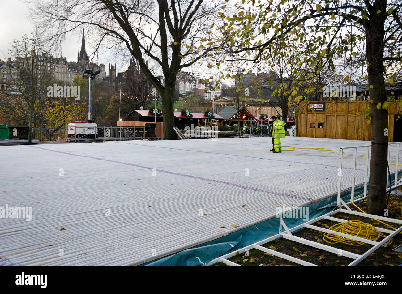 Preparations for Edinburgh's Christmas 2014. Freezing-down the ice rink ...
