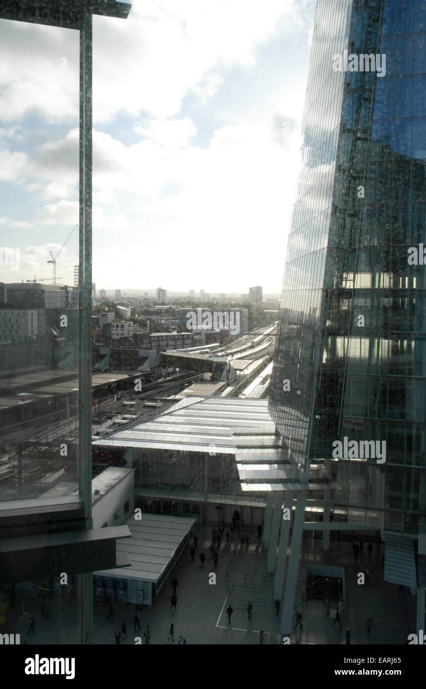 London Bridge station entrance and railway lines and the Shard Stock ...