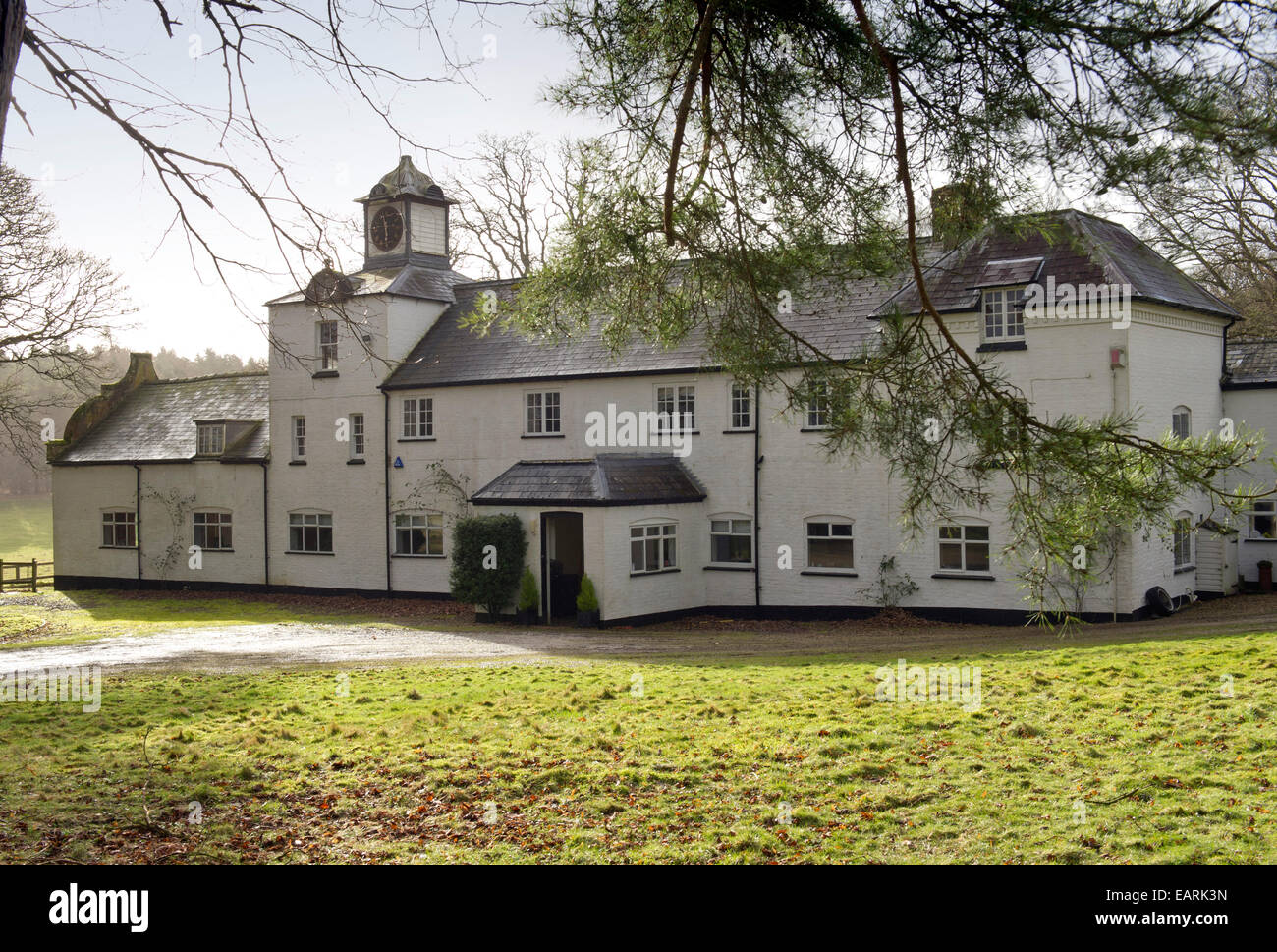 Tottenham House (red car outside) the family seat of Lord Cardigan with ...