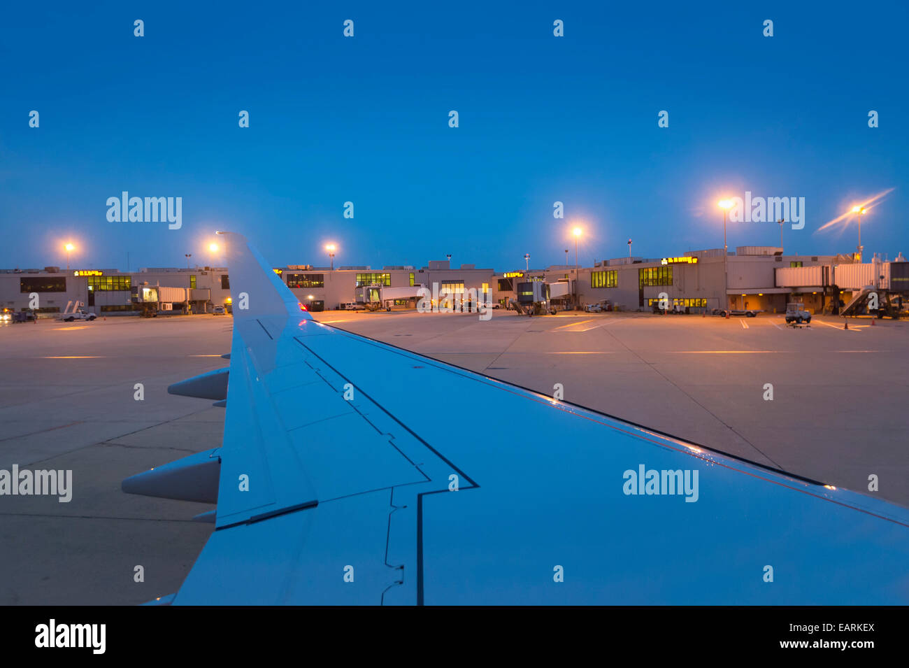 Looking Out Airplane Window As Plane Approaches Airport Gate Stock ...