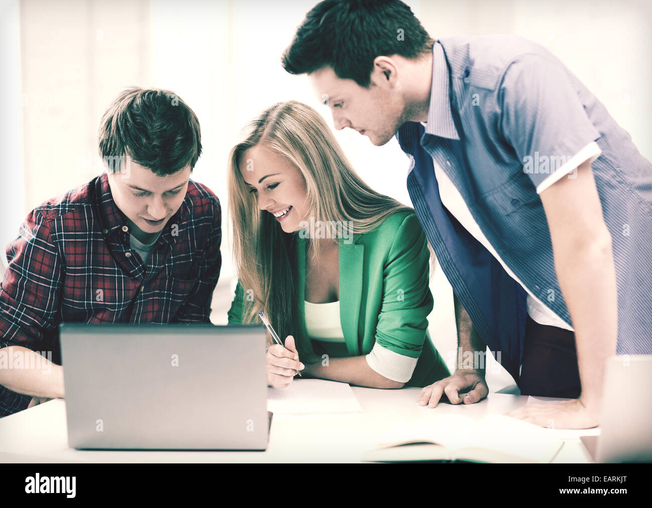 students writing test or exam in lecture at school Stock Photo - Alamy