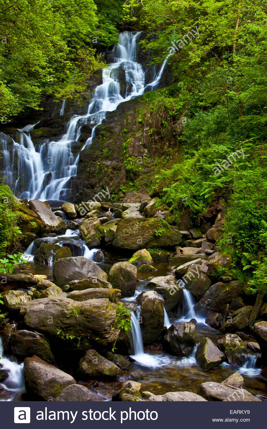 Torc Waterfalls flow out of the mountains into Muckross Lake Stock ...