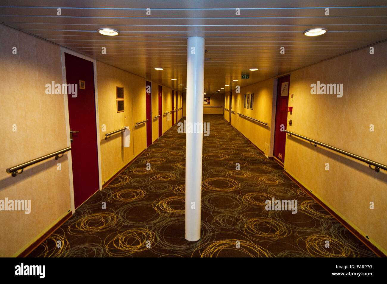 A corridor in a ship and doors leading to passengers cabins Stock Photo ...