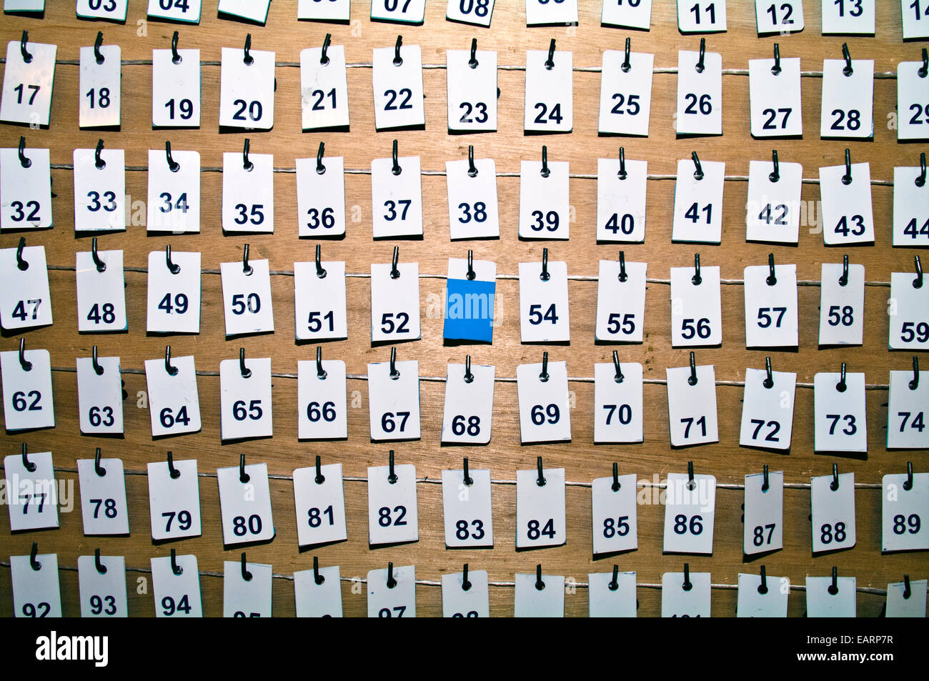 Numbered safety tags tourists flip when boarding and leaving the ship ...