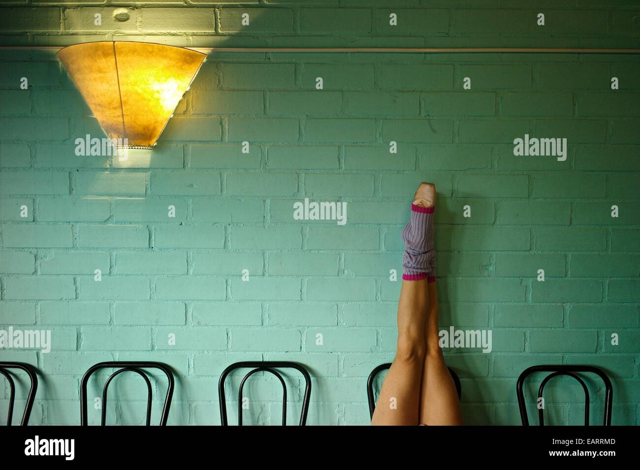 A professional dancer warms up for her daily ballet routine Stock Photo ...