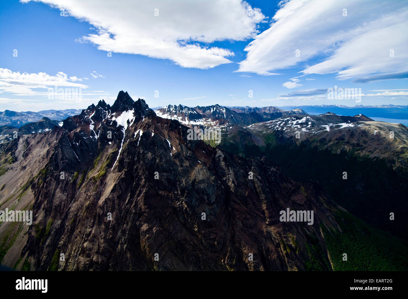 Mount Olivia's jagged summit towering over the Andes mountain range ...