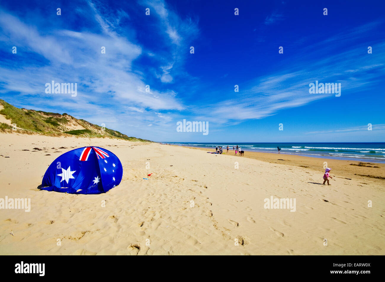 An Australian flag beach dome for shade on a sunny beach Stock Photo ...