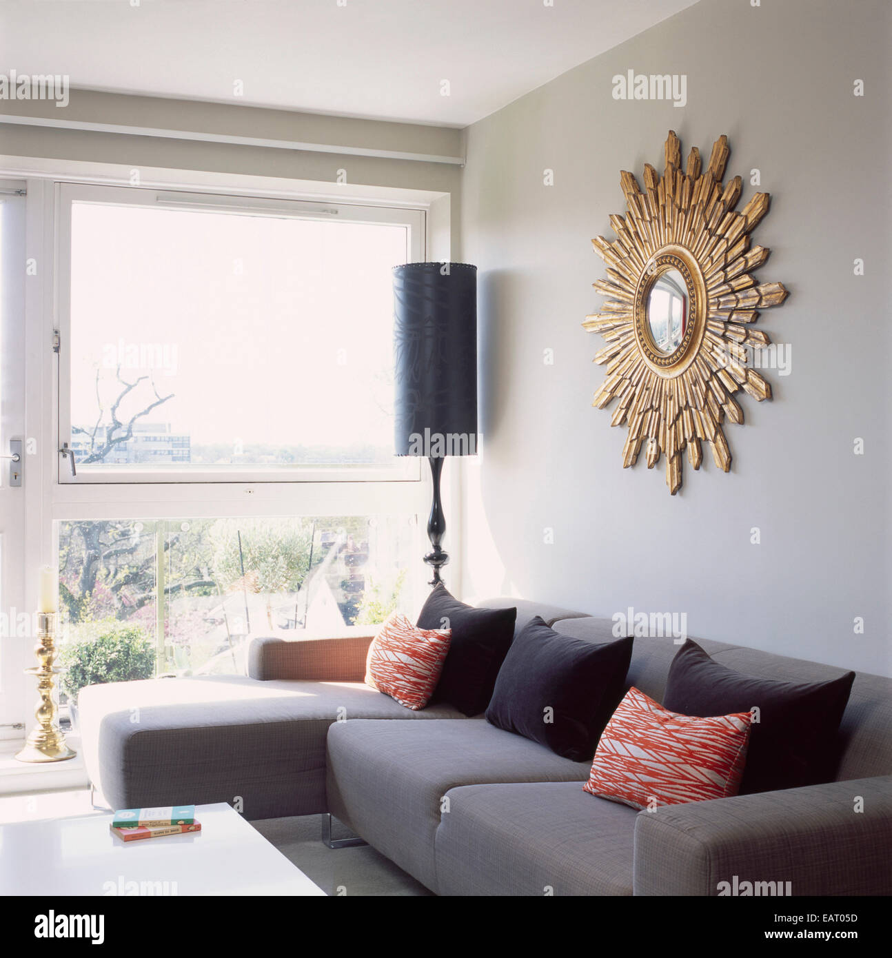 Corner upholstered seating next to window in modern living room Stock ...