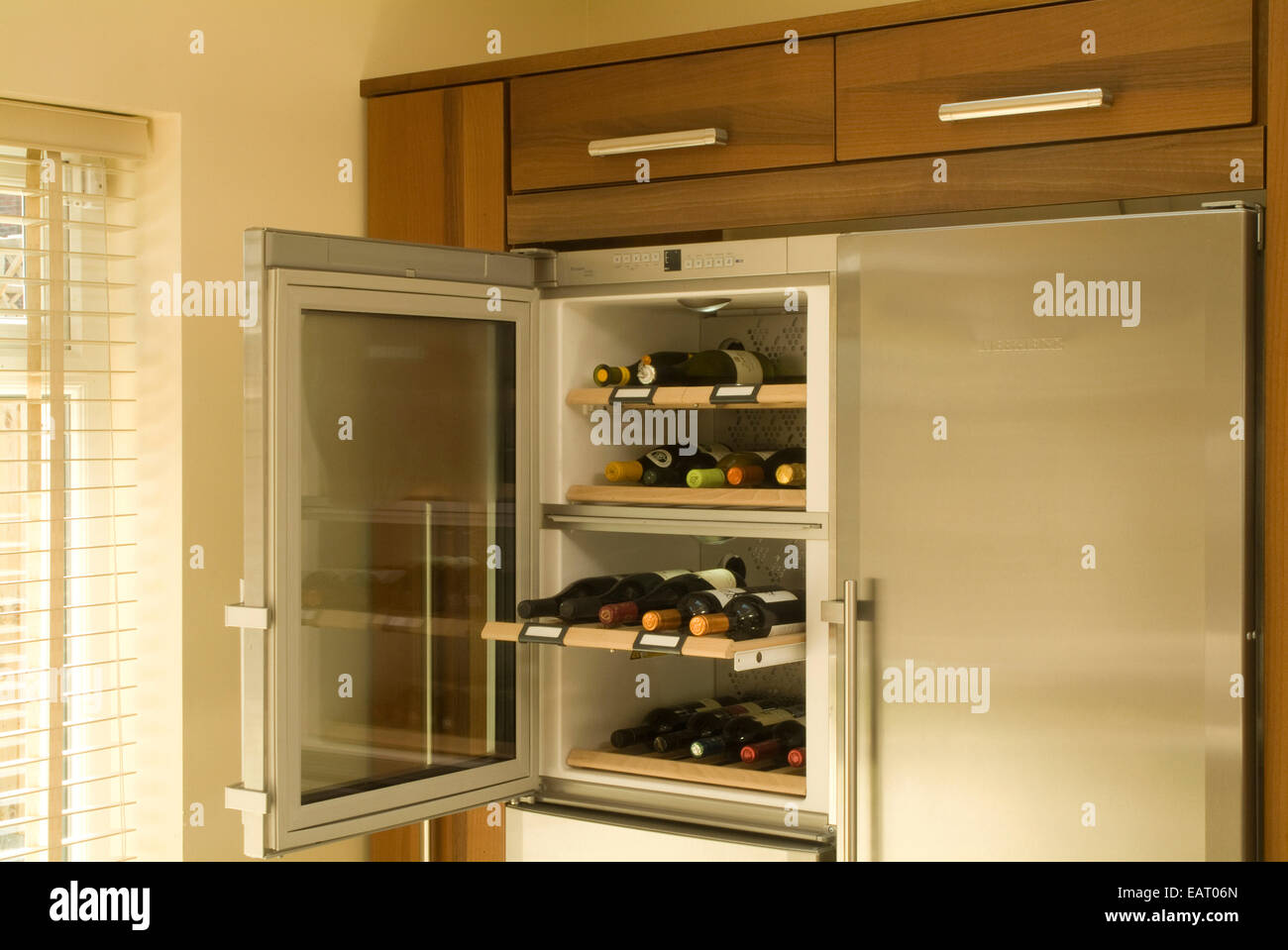Integral fridge with wine storage in chiller unit Stock Photo - Alamy