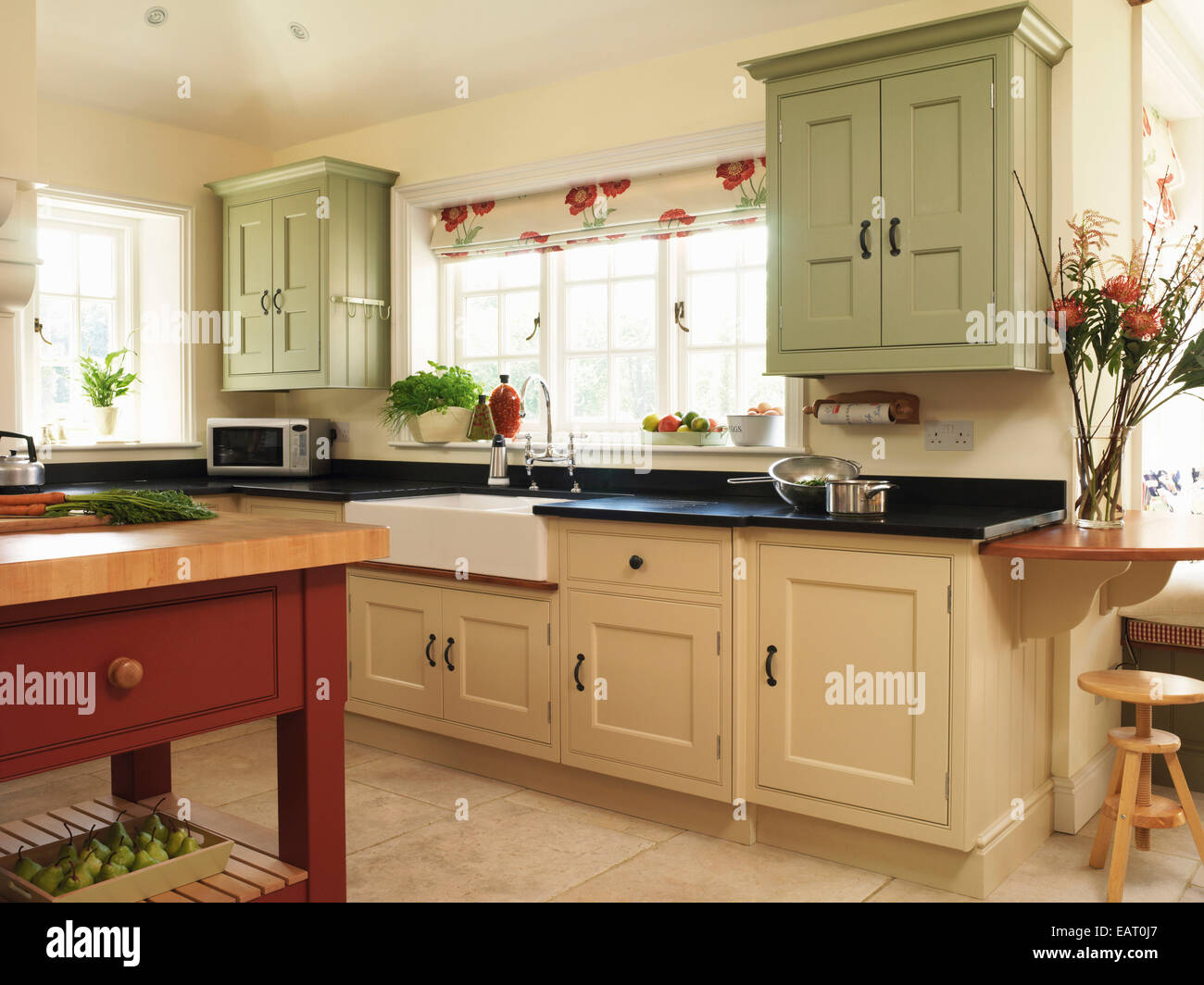 Freestanding worktop unit in centre of country style kitchen Stock ...