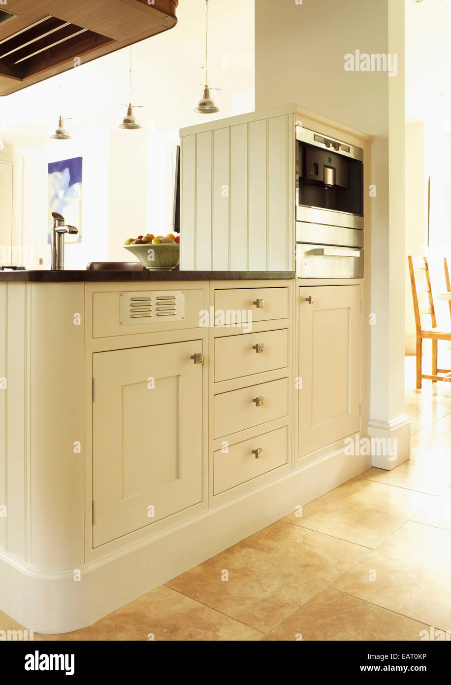 Integral microwave oven on top of fitted kitchen drawer unit Stock ...