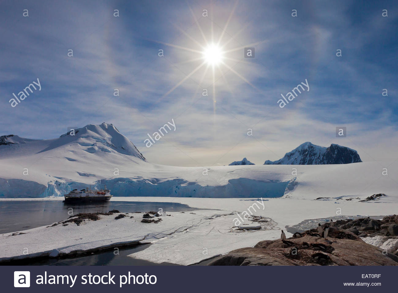 A halo shines around the sun above an arctic landscape Stock Photo - Alamy
