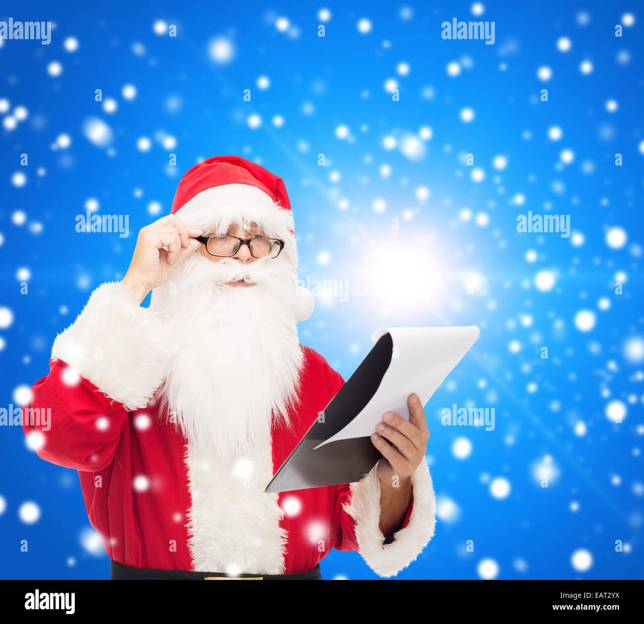 man in costume of santa claus with notepad Stock Photo - Alamy